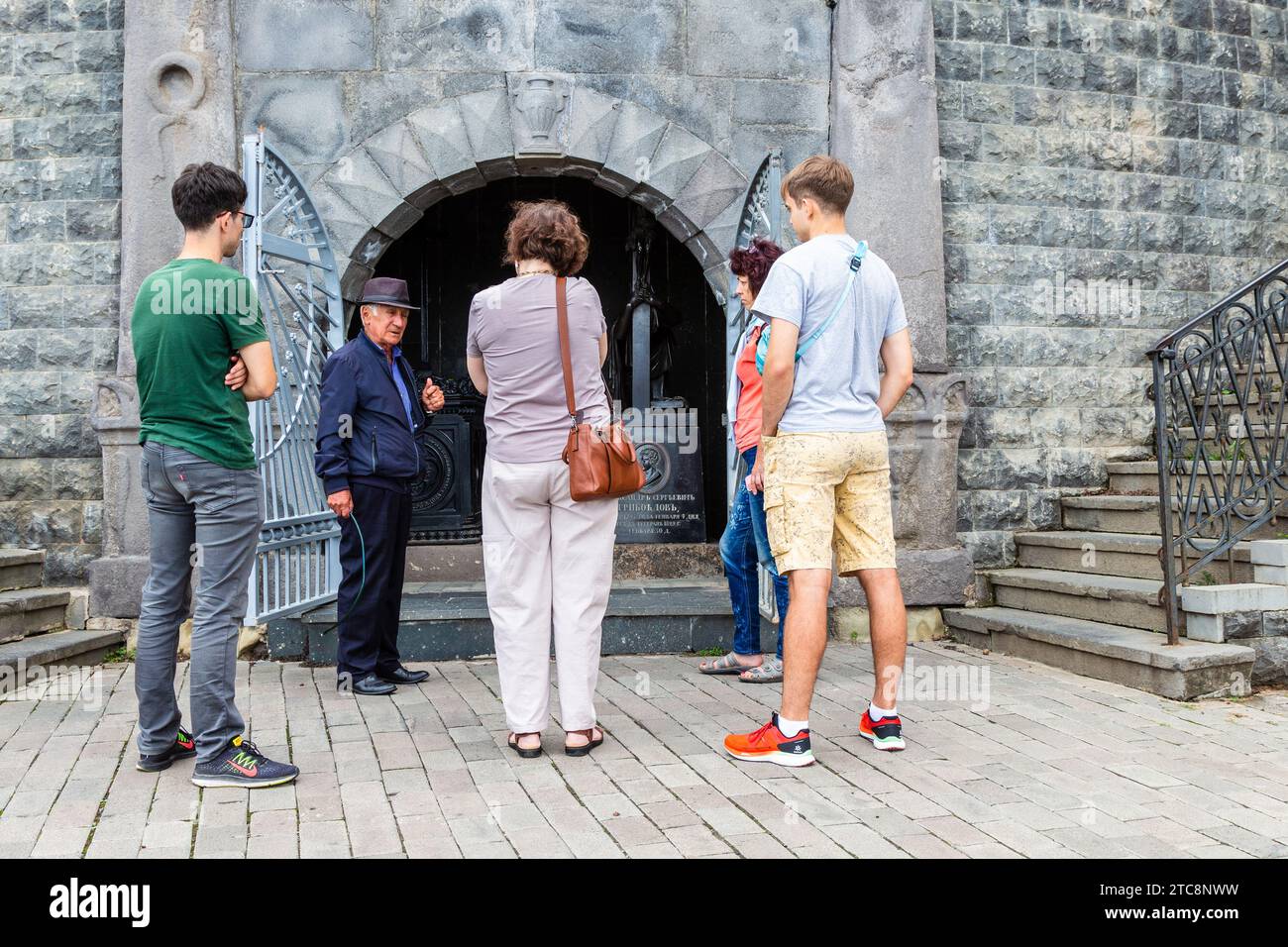 Tbilisi, Georgia - September 25, 2023: guide tells tourists about ...