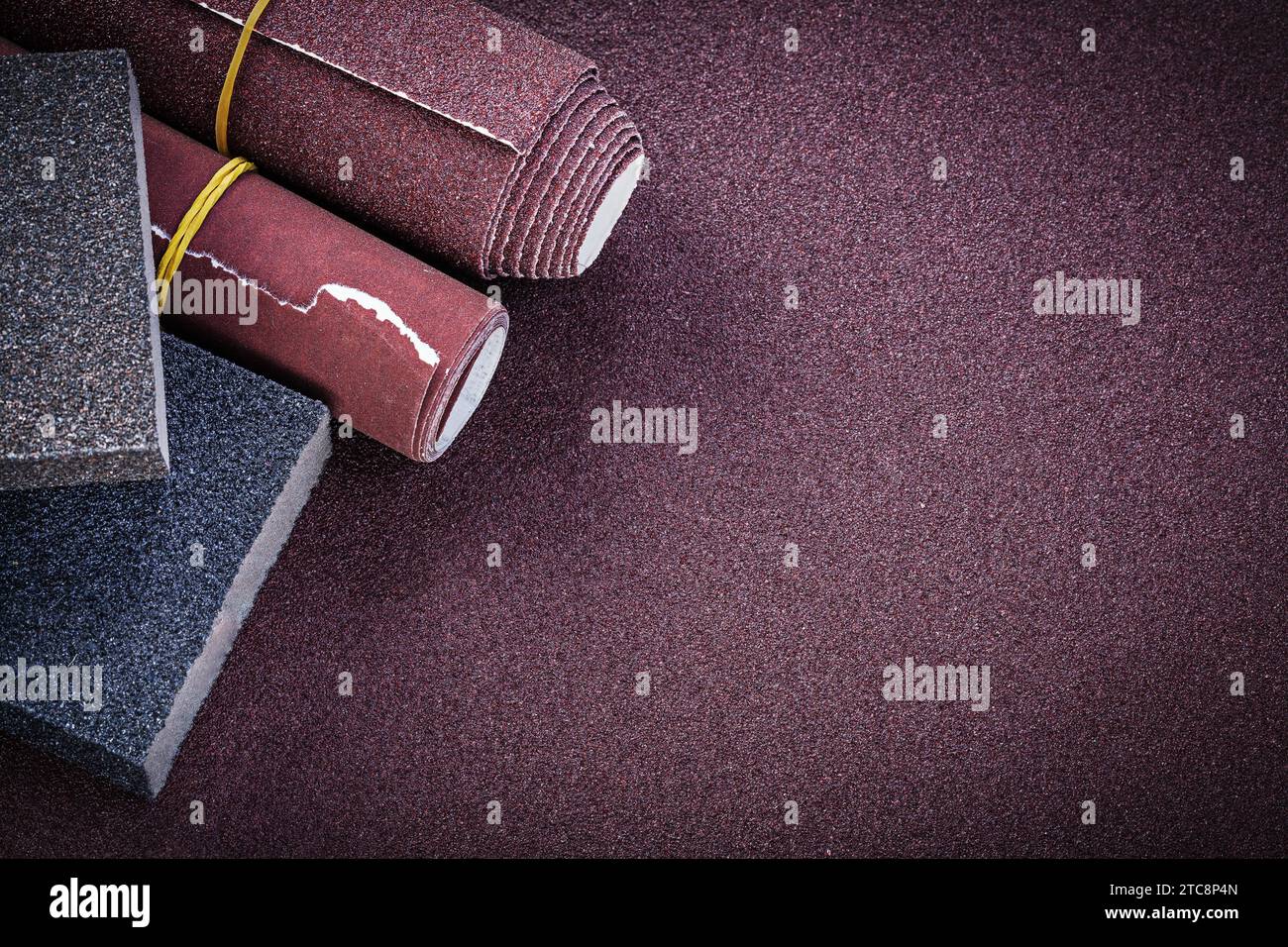 Emery paper rolls sanding sponges on polishing sheet abrasive materials ...