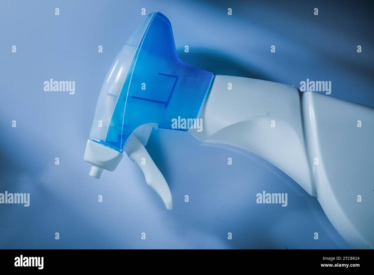 Plastic sprayer on white background Stock Photo - Alamy