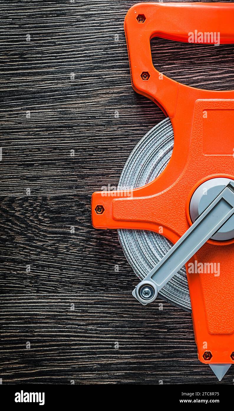 Rolled up tape measure hi-res stock photography and images - Alamy