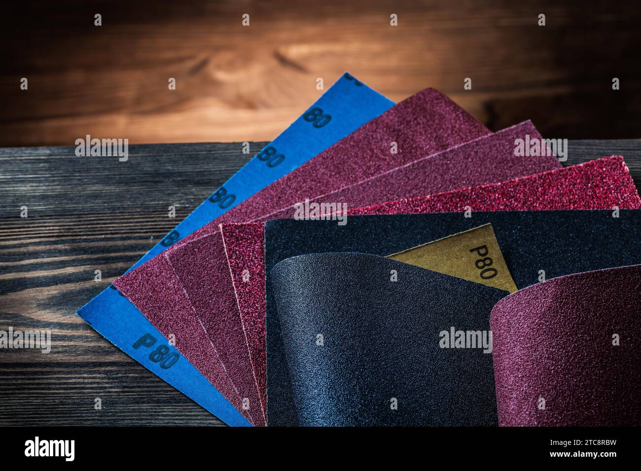 Sandpaper assortment on vintage wood background Stock Photo - Alamy