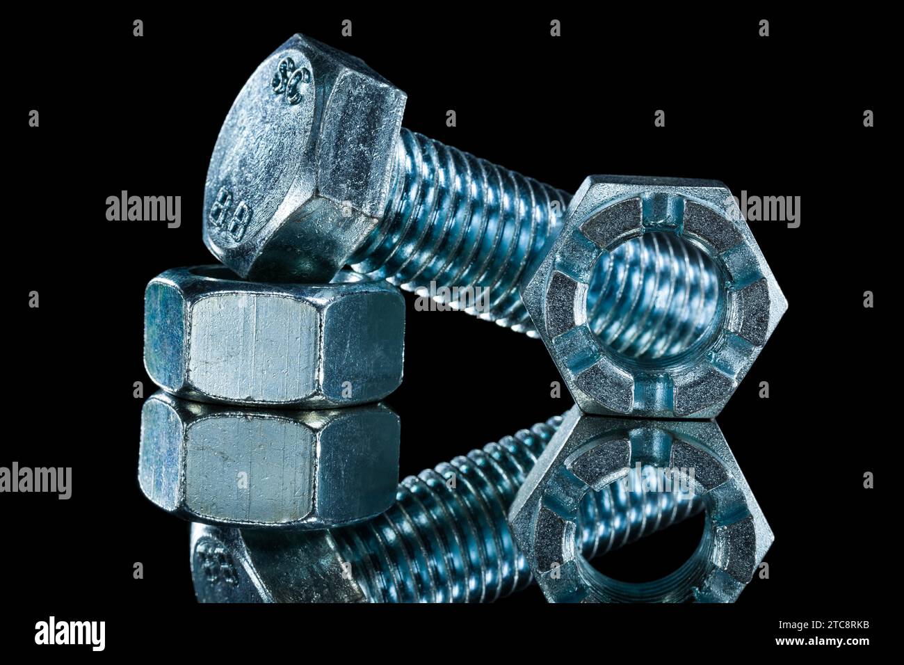 Construction Nuts Screw bolts on black background Top view Stock Photo ...