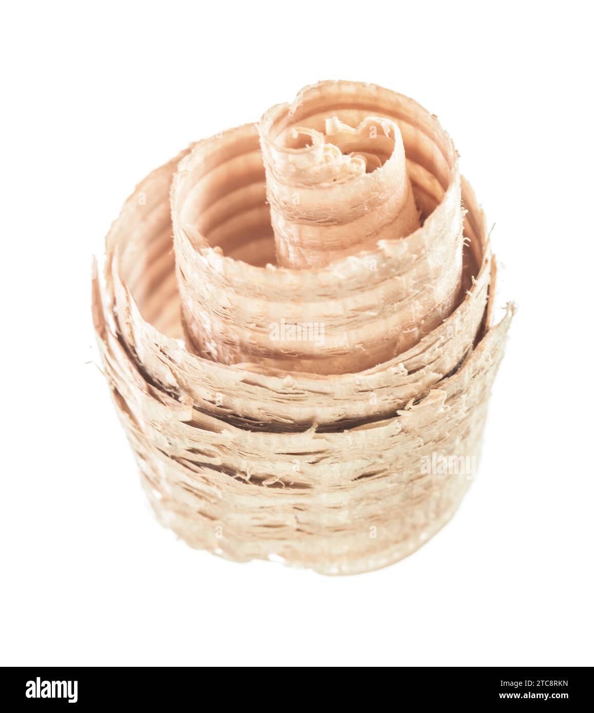 Curly wood shavings against a white background Stock Photo - Alamy