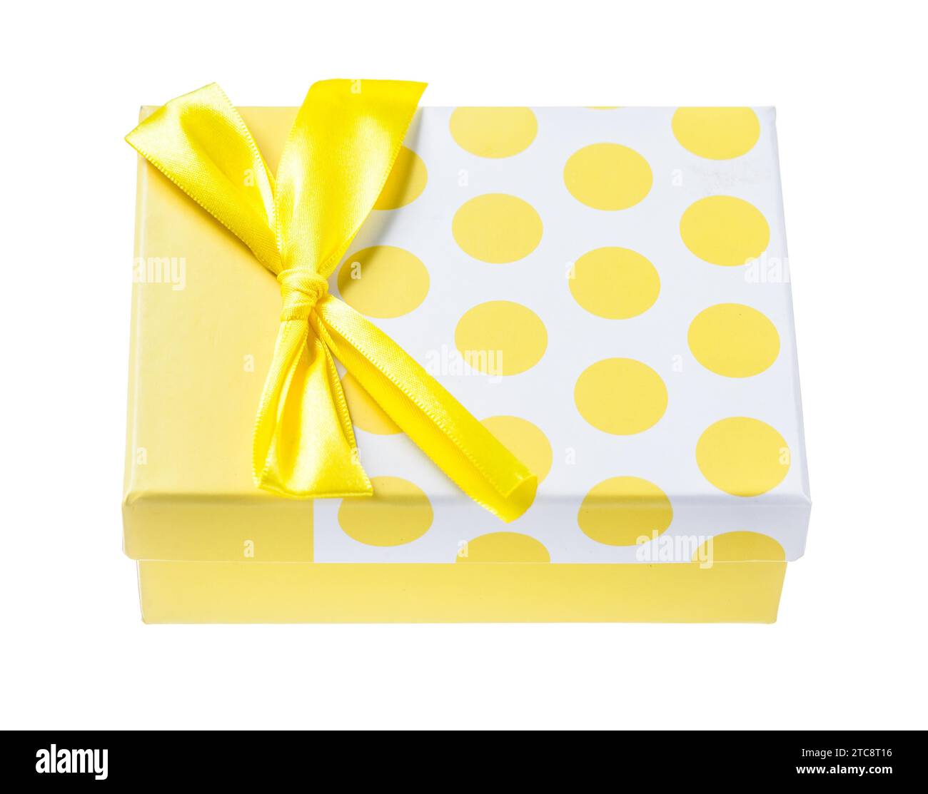 Yellow gift box against a white background Stock Photo - Alamy