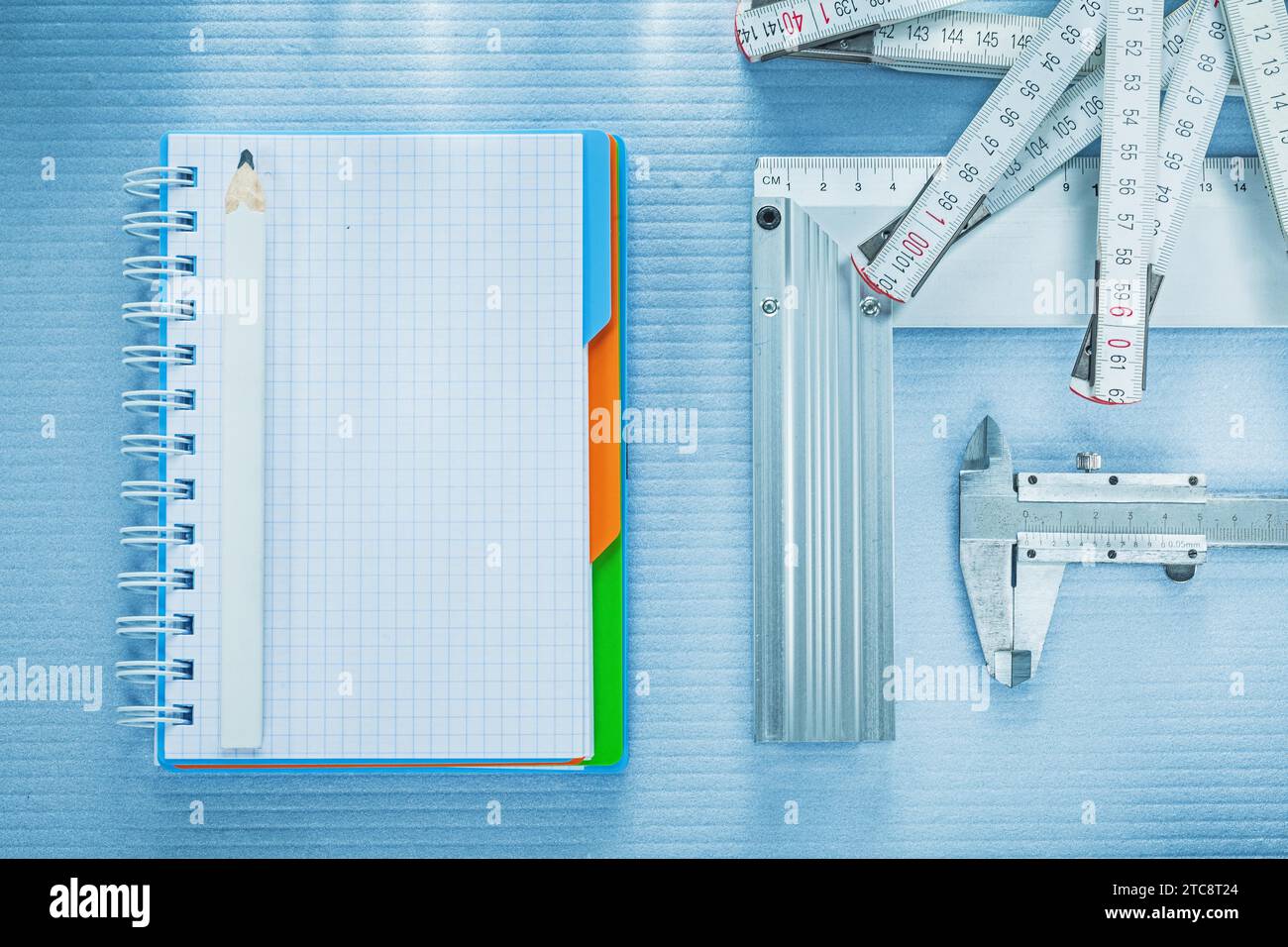 Square ruler Calipers Notepad Pencil Tape measure Stock Photo - Alamy