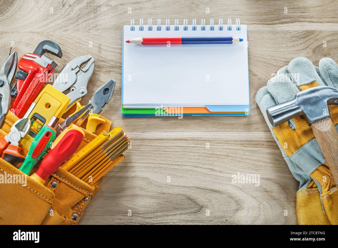 Construction tools Tool belt Protective gloves Claw hammer Notepad ...