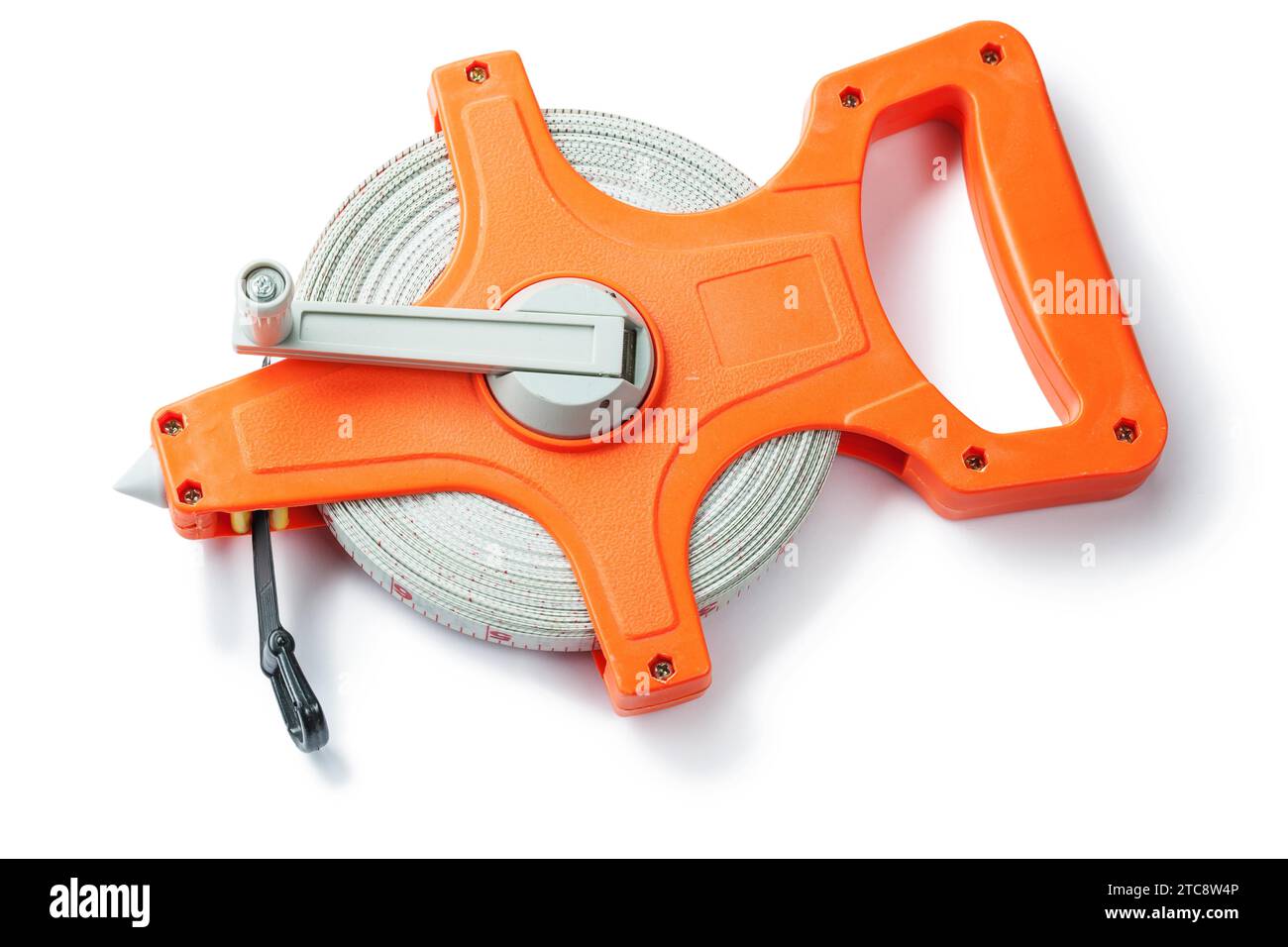 Large building tape measure against a white background Stock Photo - Alamy