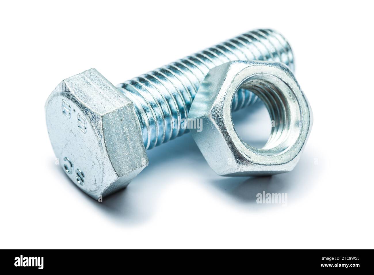 Large screw and nut against a white background Stock Photo - Alamy