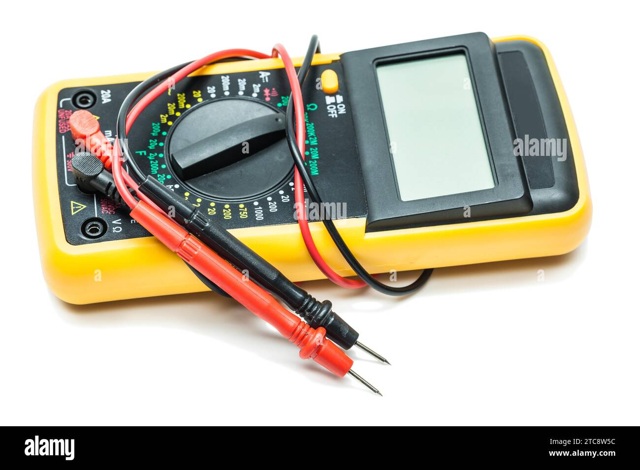 Black and yellow electric multitester against a white background Stock ...