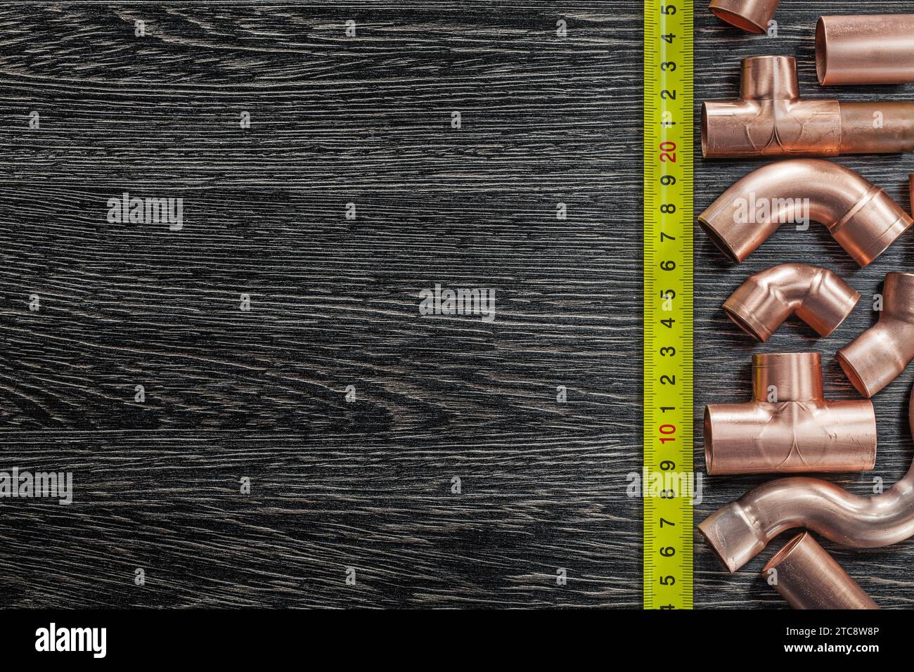 Measuring tape for copper water pipes Stock Photo - Alamy