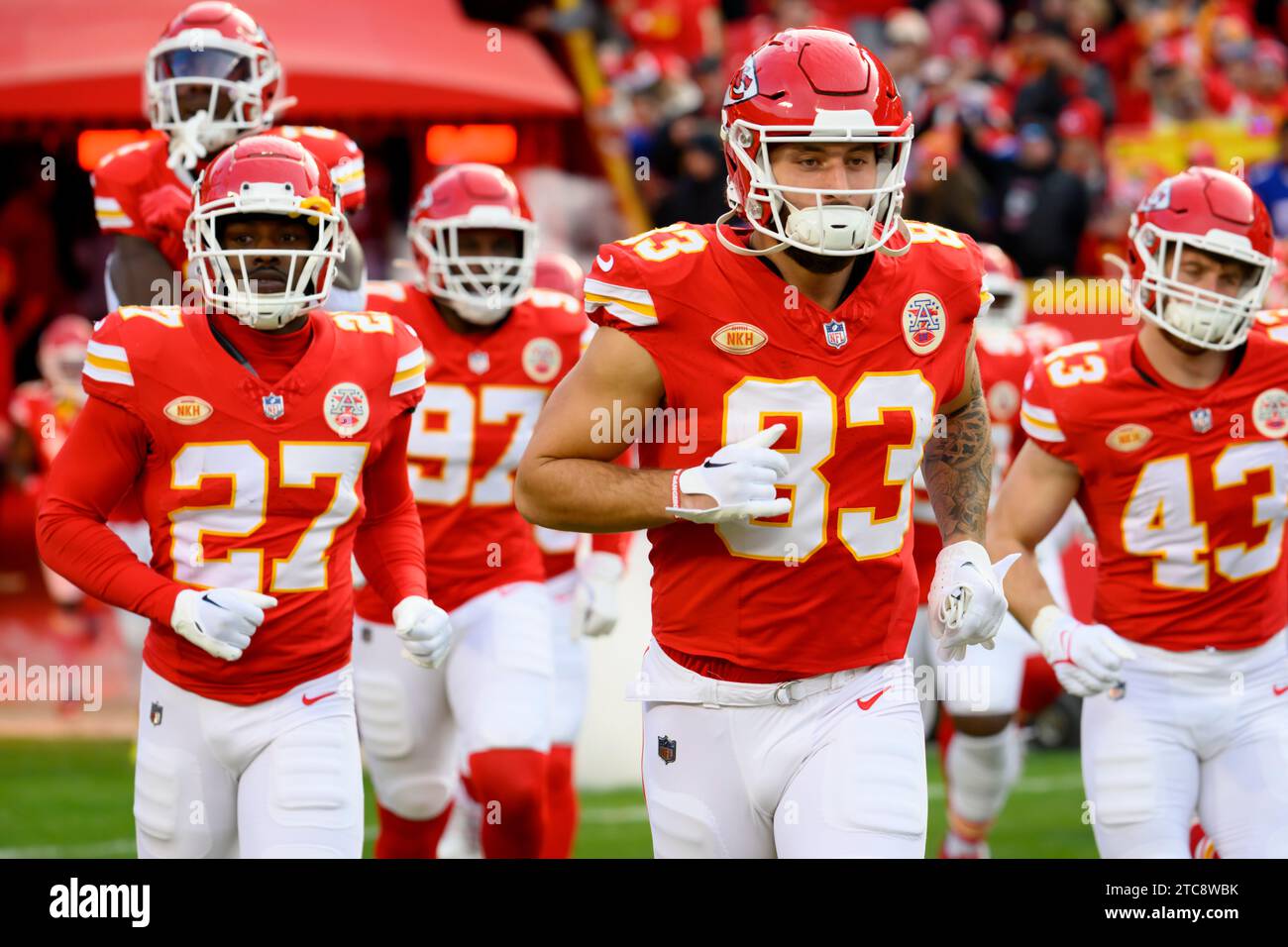 Kansas City Chiefs tight end Noah Gray (83) and other members of the ...