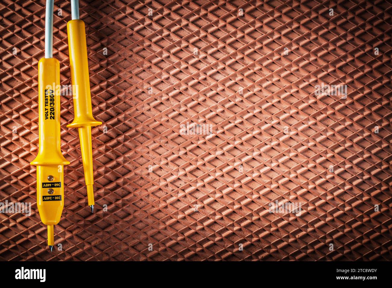 Electrical tester on dielectric rubber mat Electricity concept Stock ...