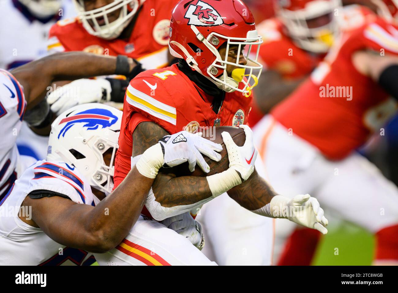 Buffalo Bills defensive end Greg Rousseau, left, tackles Kansas City ...