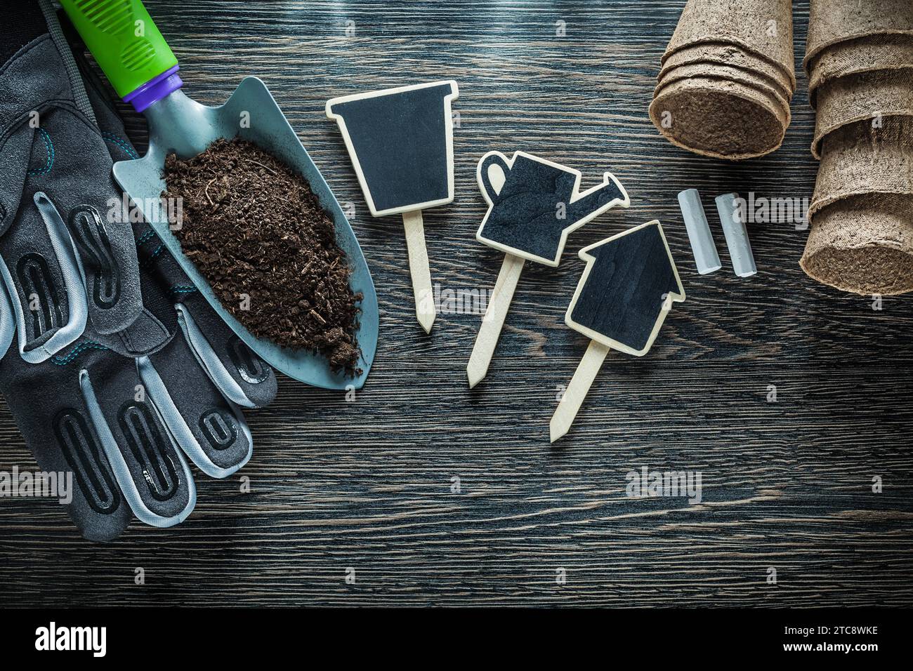 Gardening hand spade soil peat pots protective gloves chalkboard sign ...