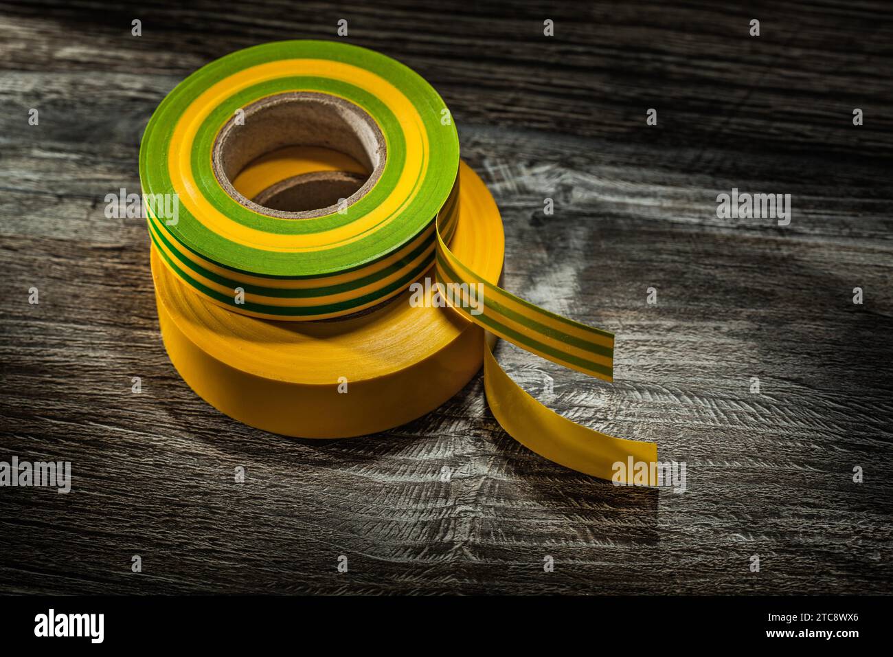 Insulating tapes on wooden panel horizontal image Stock Photo - Alamy
