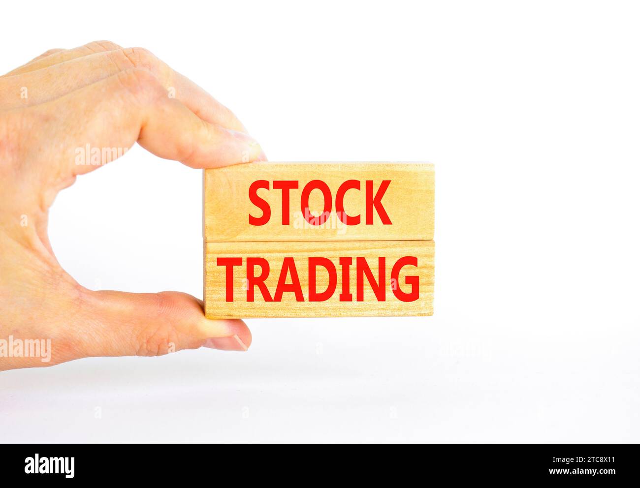 Stock trading symbol. Concept words Stock trading on beautiful wooden ...