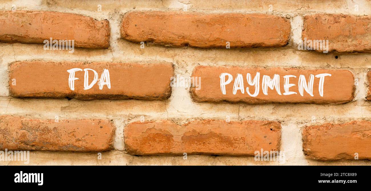 FDA Food and Drug Administration payment symbol. Concept words FDA ...