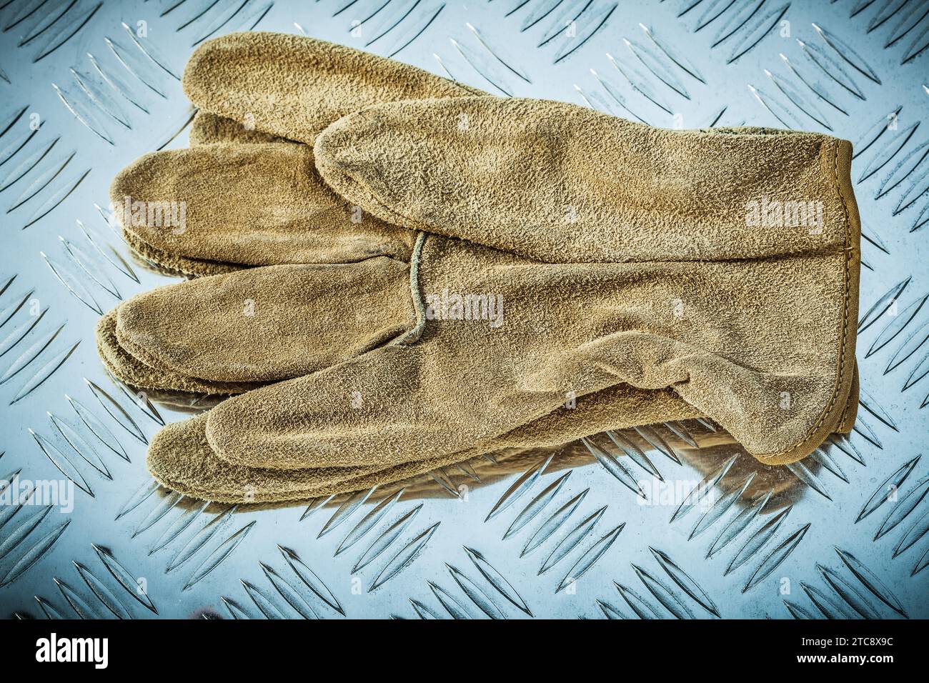 Leather safety gloves with ribbed metal texture Stock Photo - Alamy