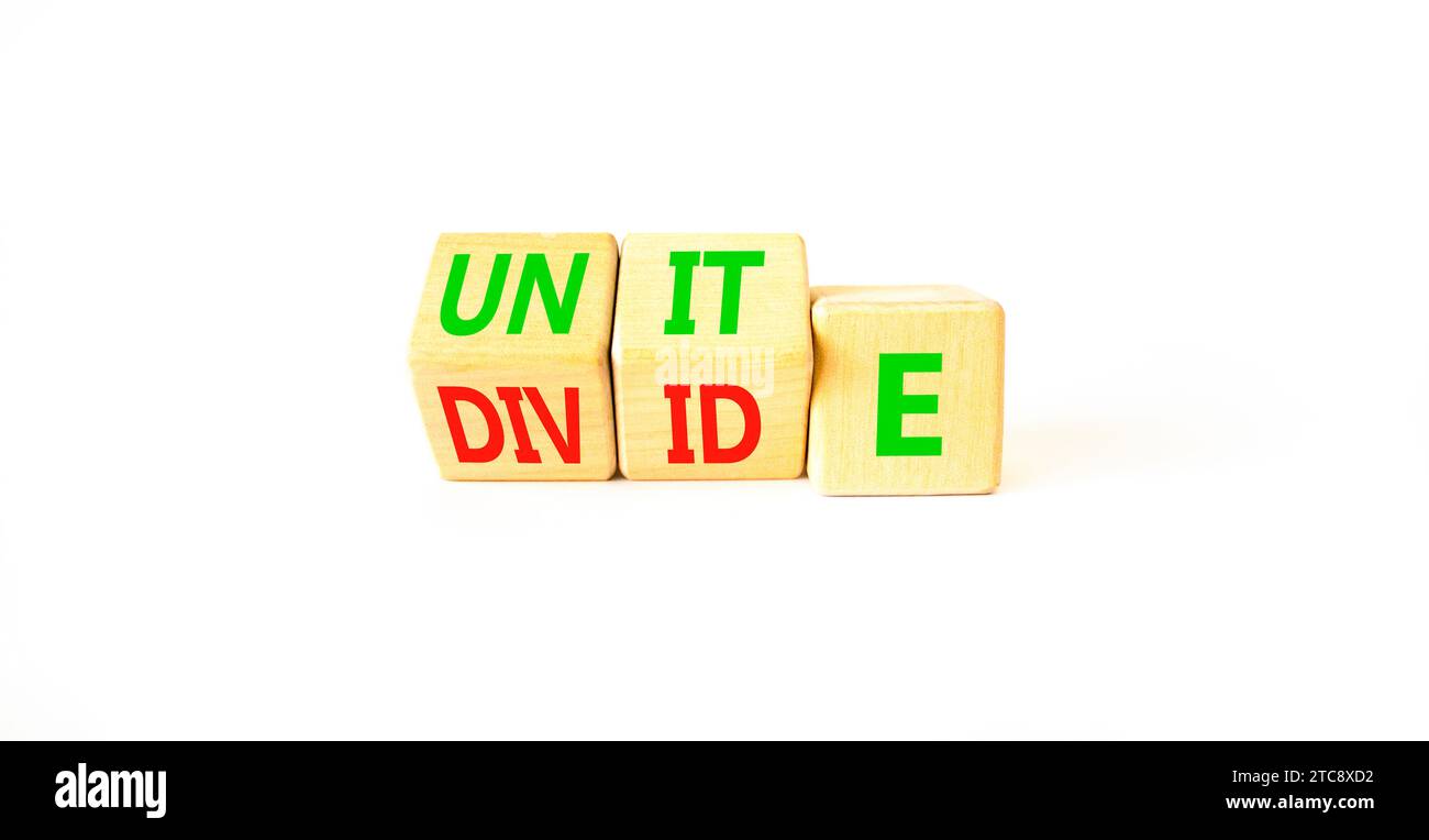 Unite or divide symbol. Concept word Unite or Divide on wooden cubes ...