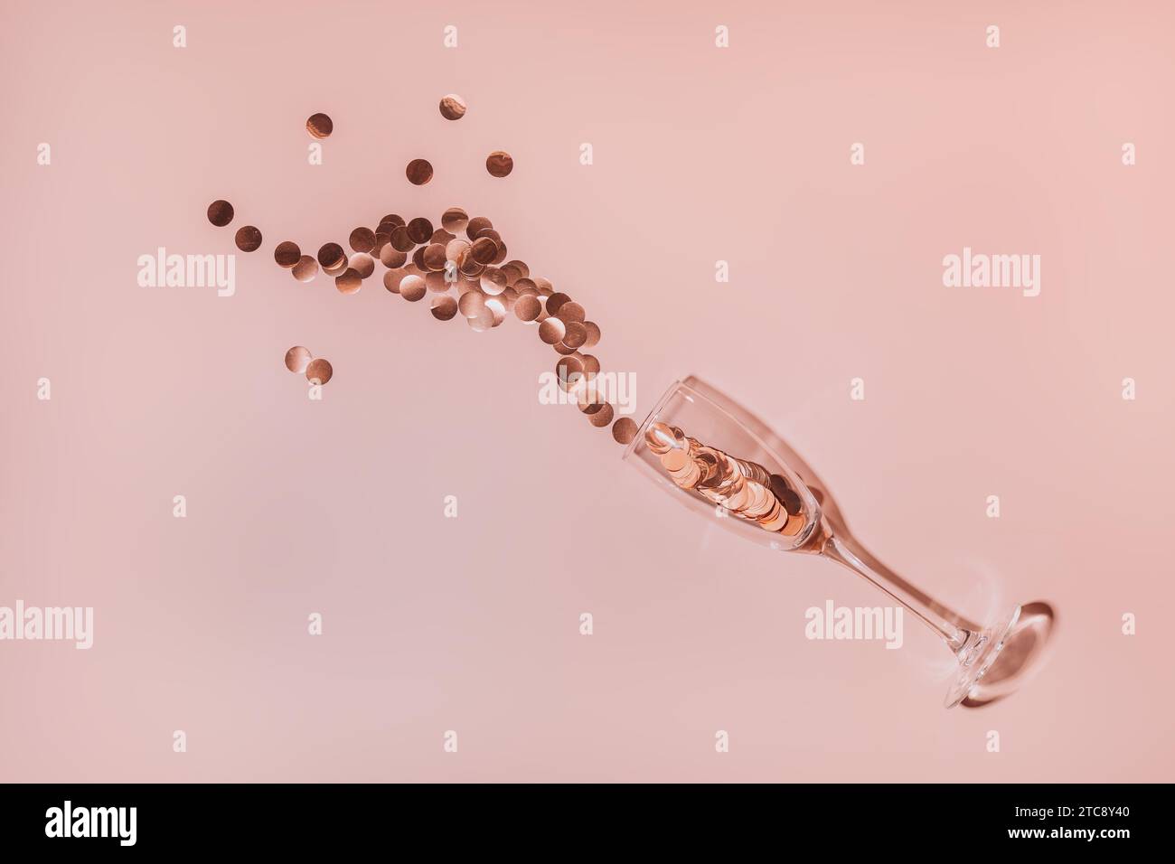 Large round sparkles fly out of a glass against a pink background Stock ...