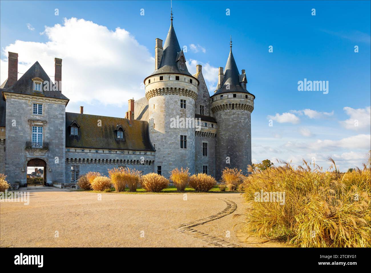 Fairy tale castle with round turrets in the bright winter sunshine ...