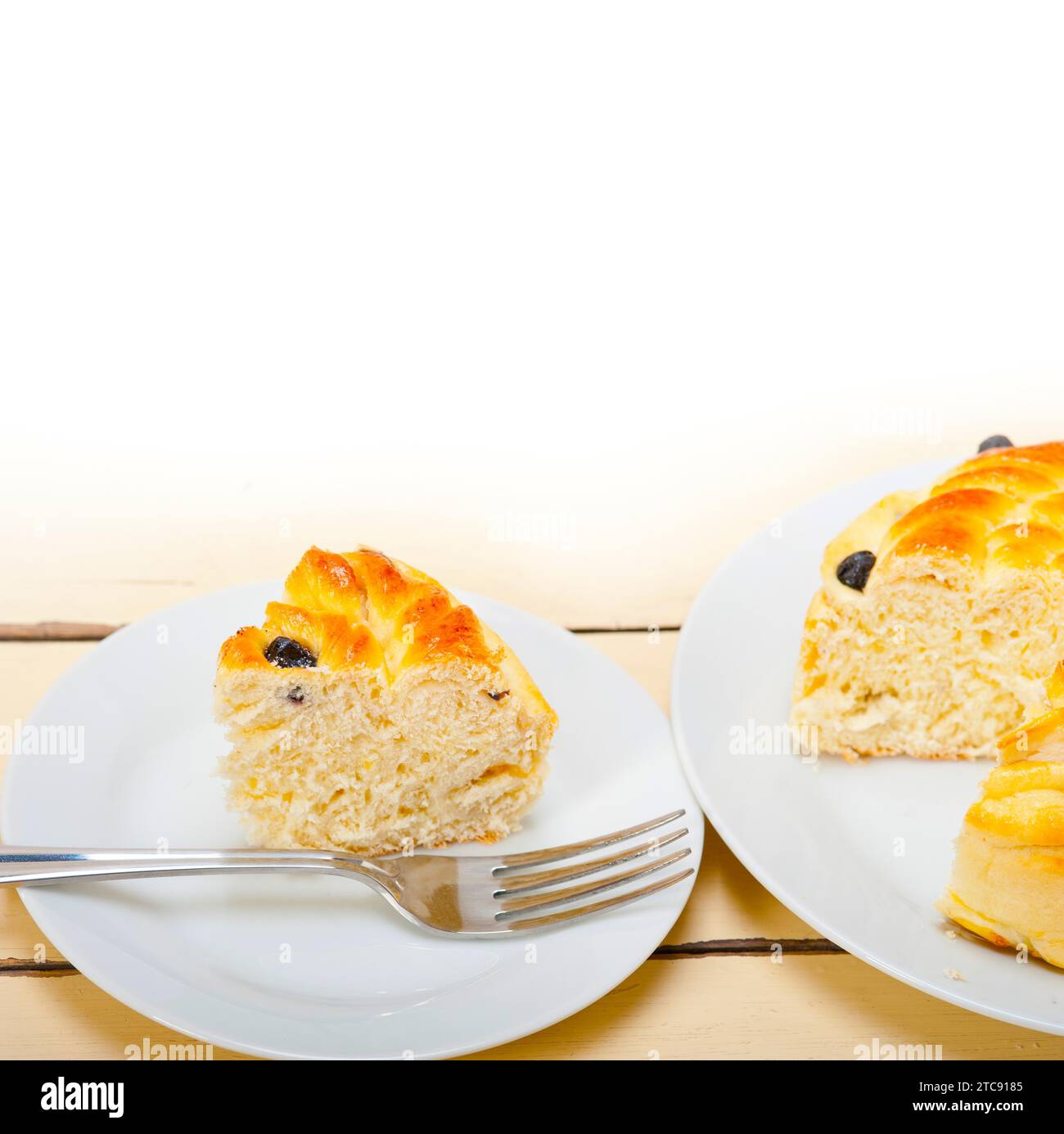 Fresh home baked blueberry bread cake dessert over white wood table ...