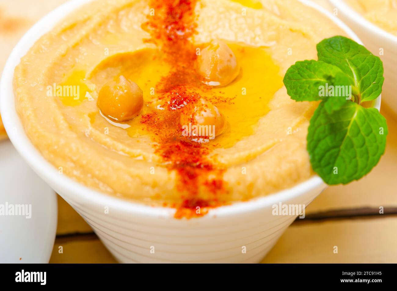 Traditional chickpeas Hummus with pita bread and paprika on top Stock ...