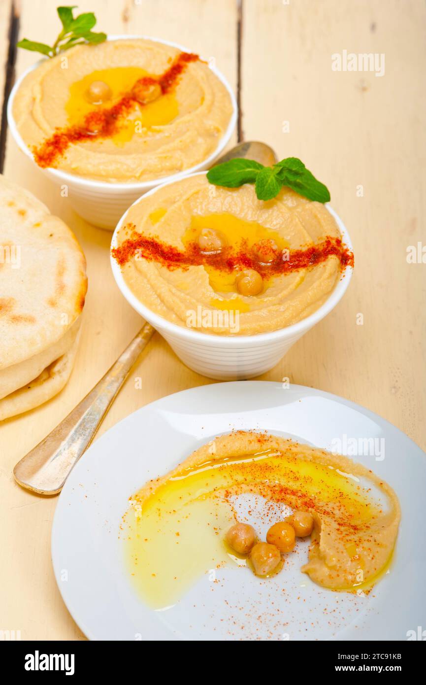 Traditional chickpeas Hummus with pita bread and paprika on top Stock ...