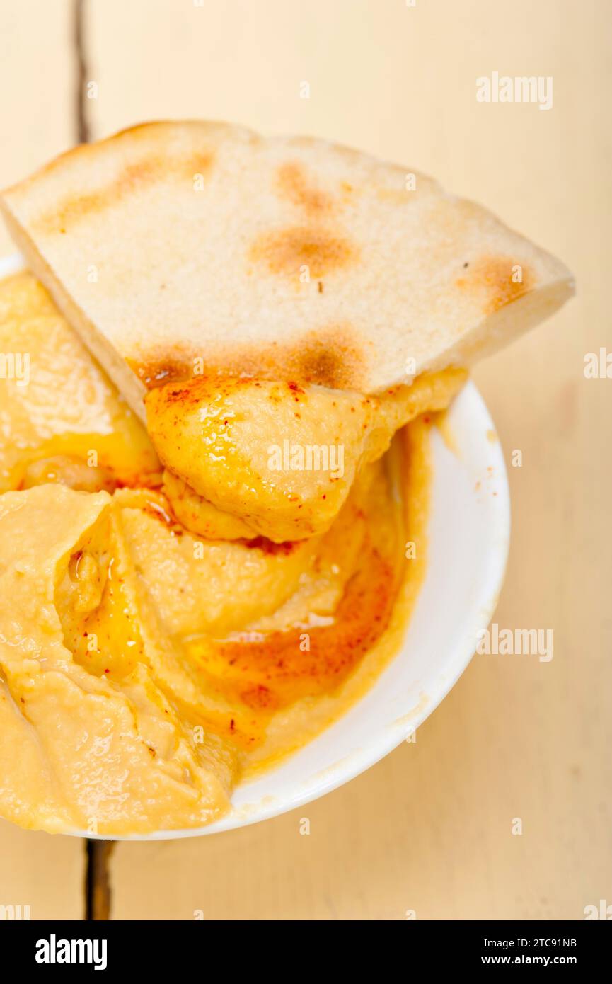 Traditional chickpeas Hummus with pita bread and paprika on top Stock ...