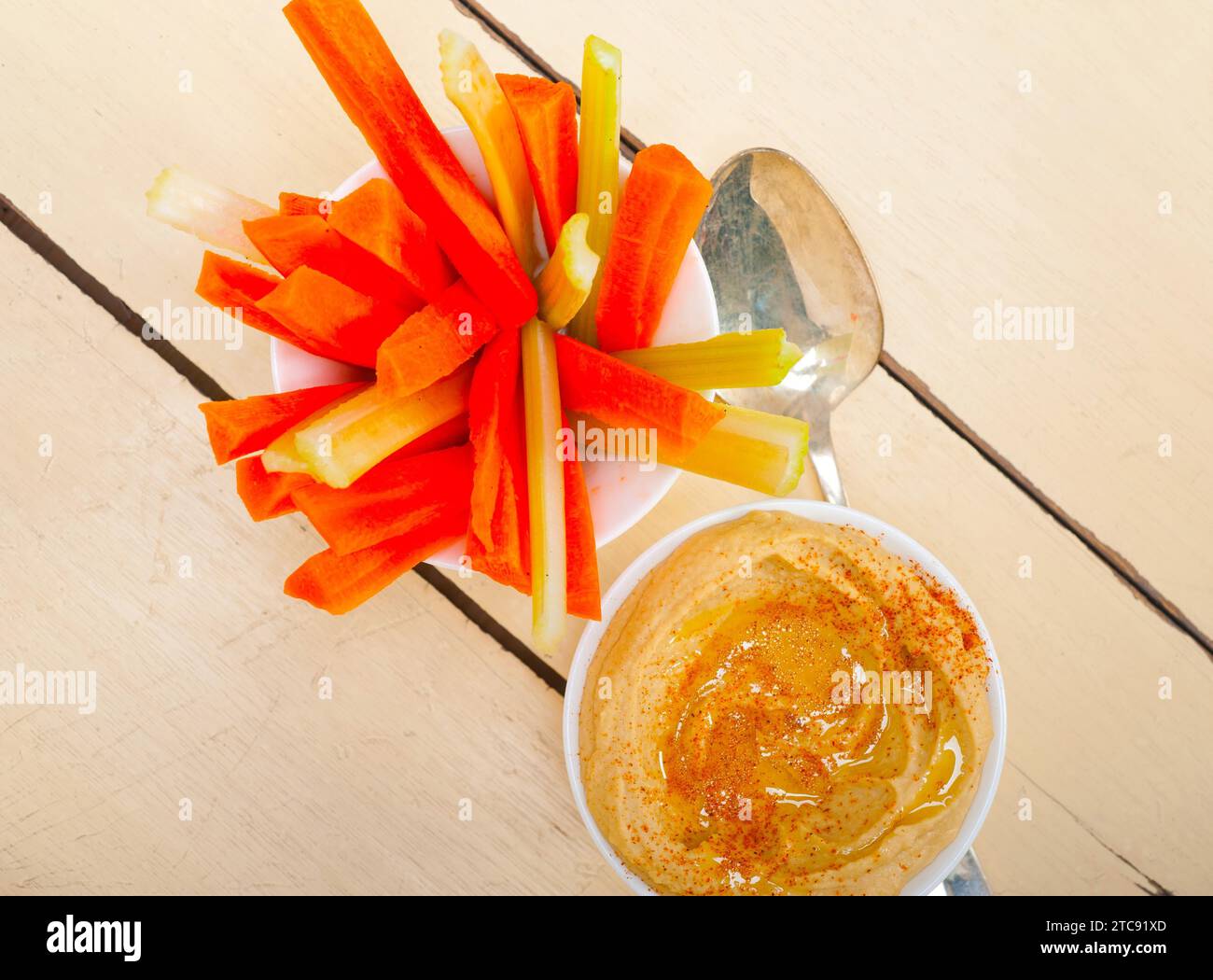 Fresh hummus dip with raw carrot and celery arab middle eastent healthy ...