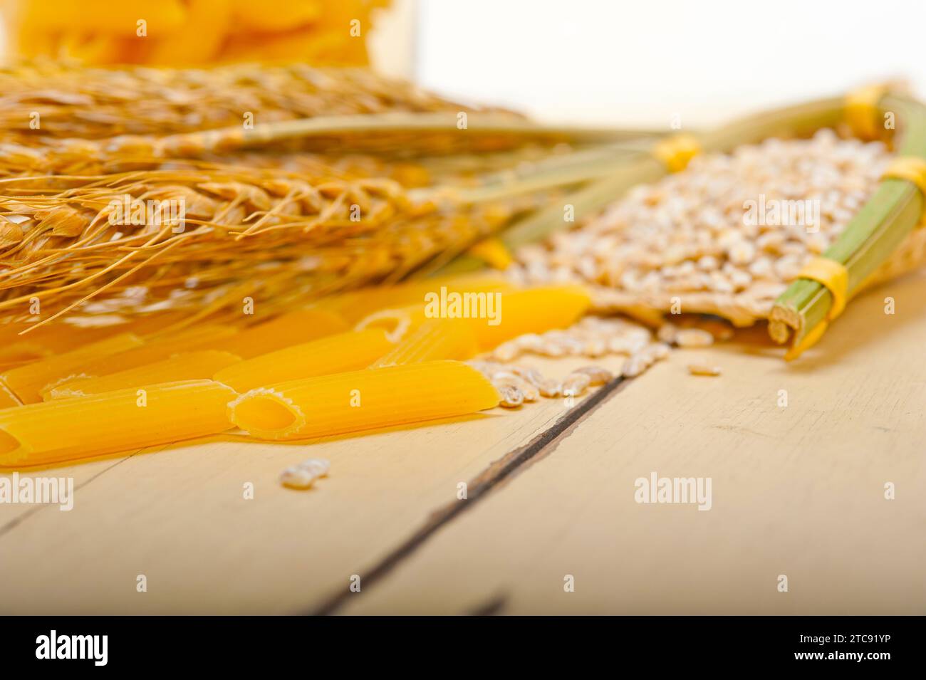 Short Italian pasta penne with durum wheat grains Stock Photo - Alamy