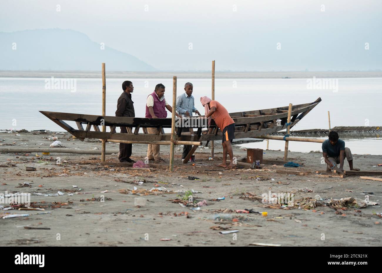 Guwahati, Assam, India. 11th Dec, 2023. Fishermen with carpenter makes ...