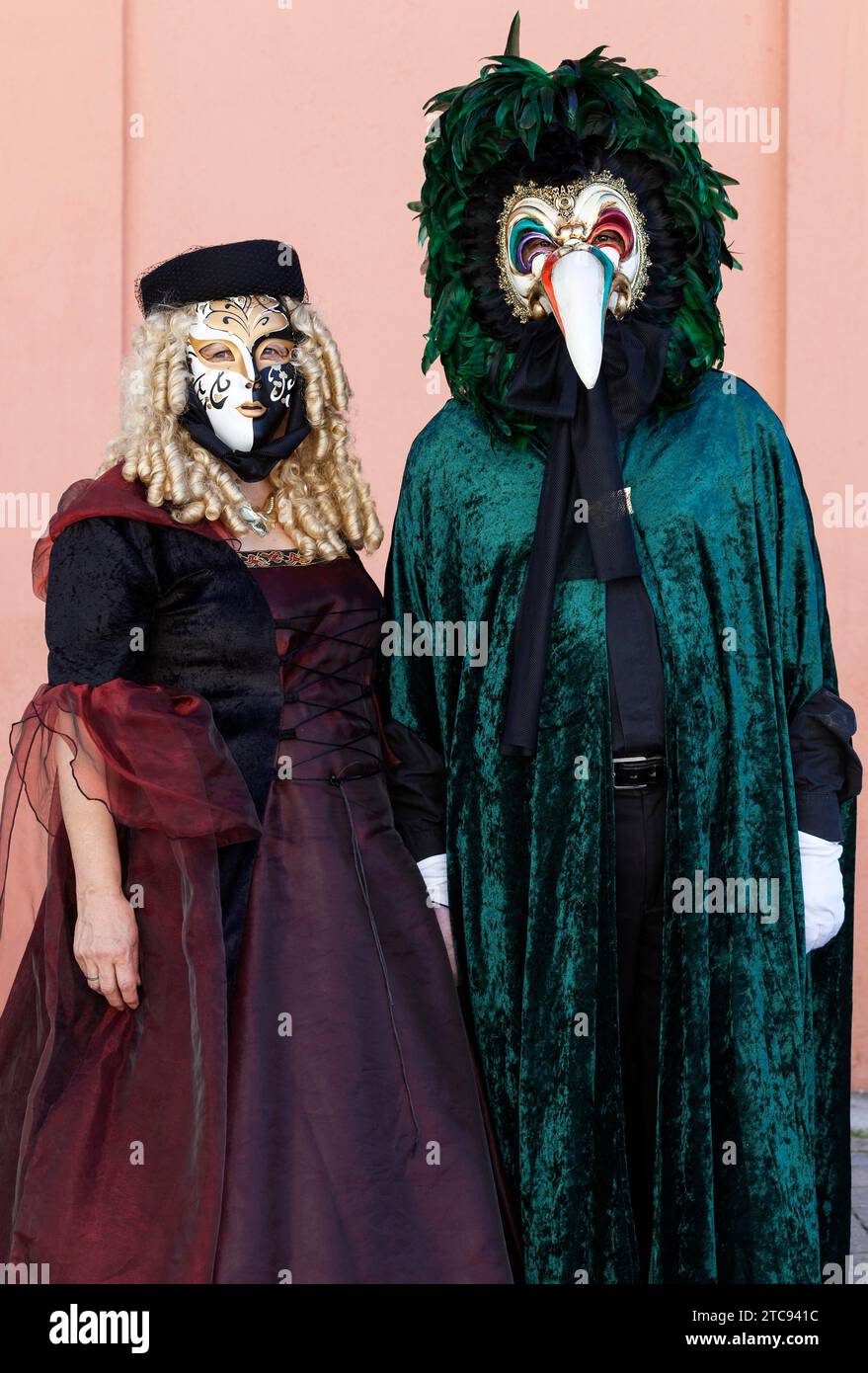 Venetian carnival masks and costumes at the Venetian fair on the ...