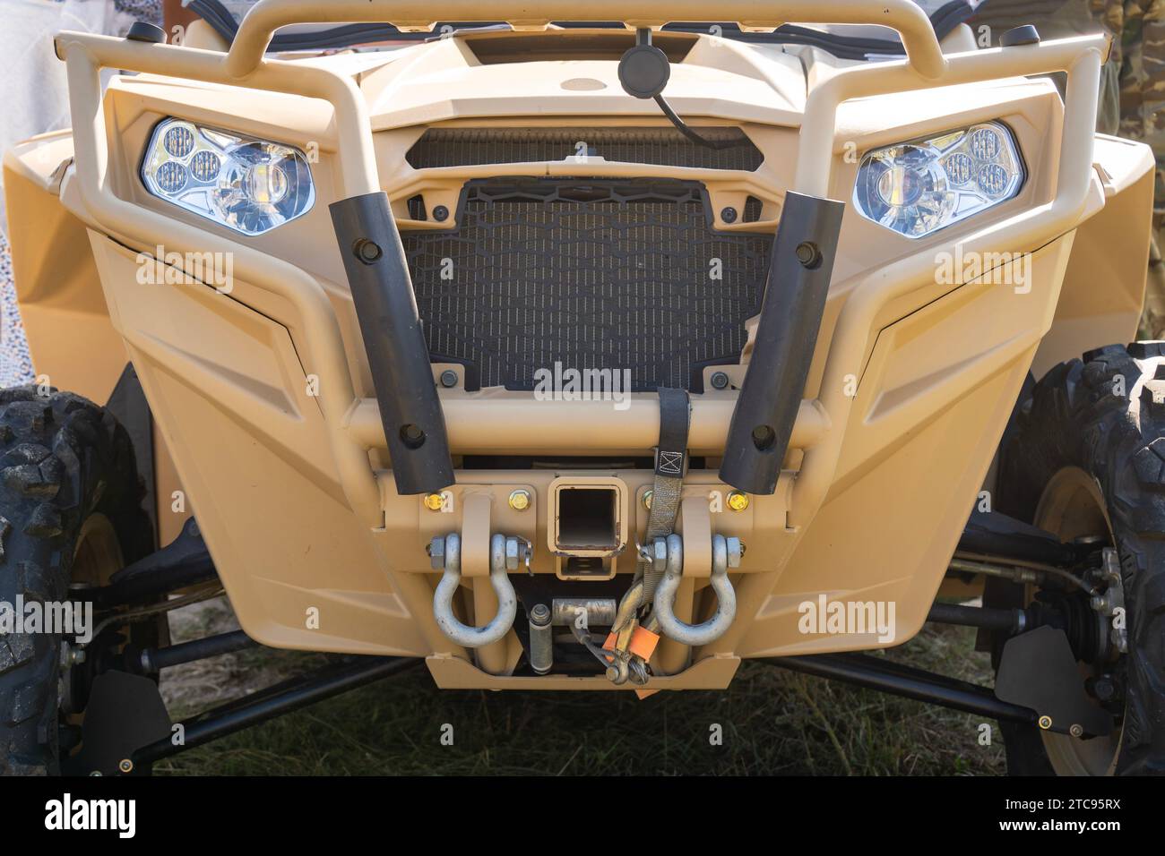 Sand colored Polaris military jeep front Stock Photo - Alamy