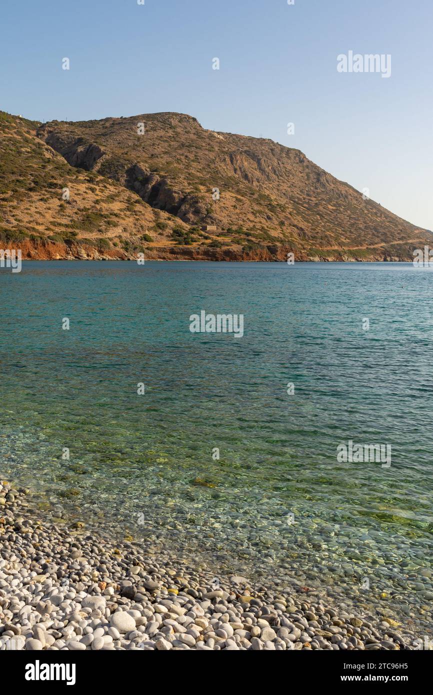 Pebble beach in the coastal village of Plaka, Crete, Greece Stock Photo ...