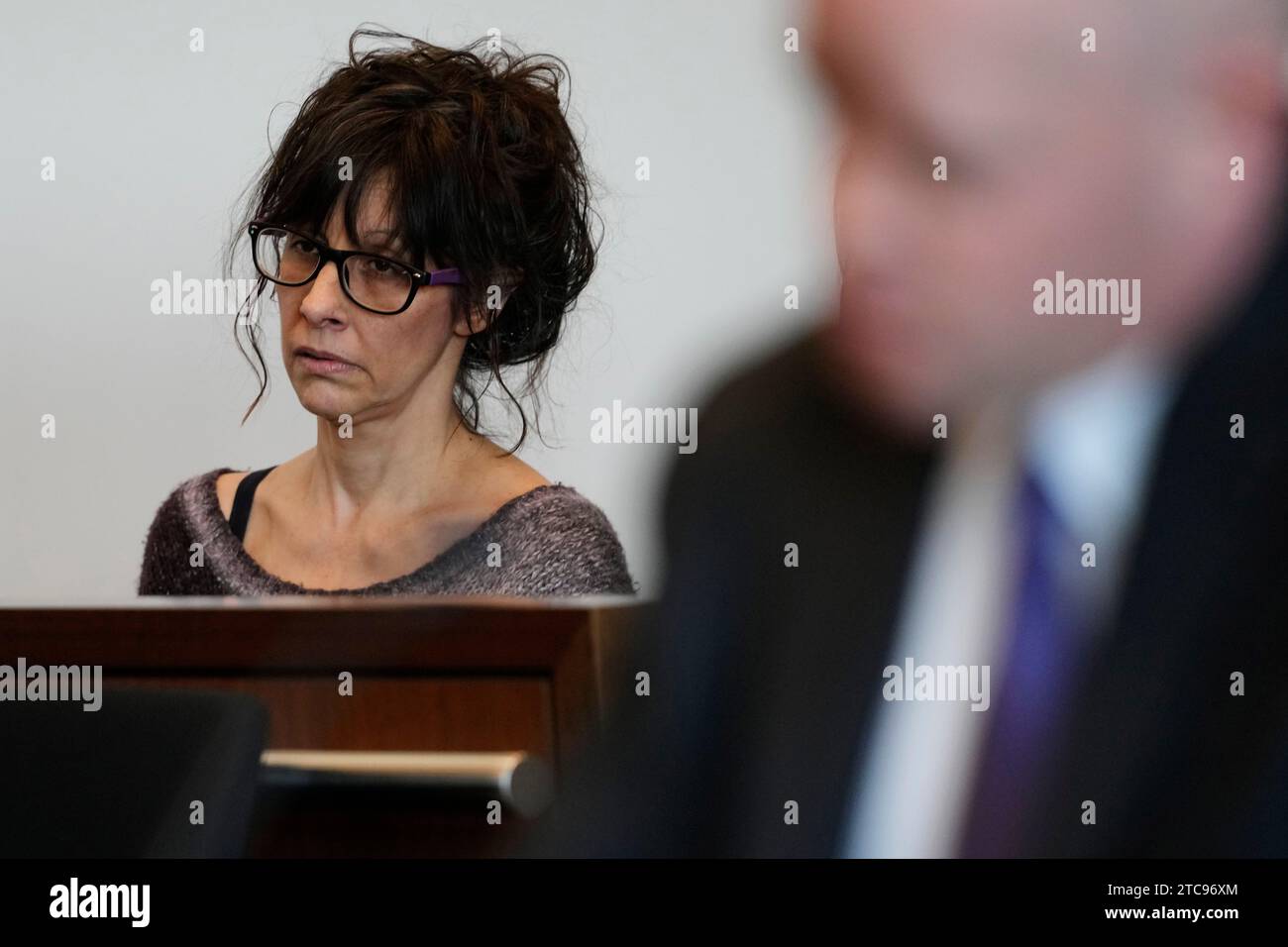 Denise Pesina, mother of Robert E. Crimo III., listens to Judge ...