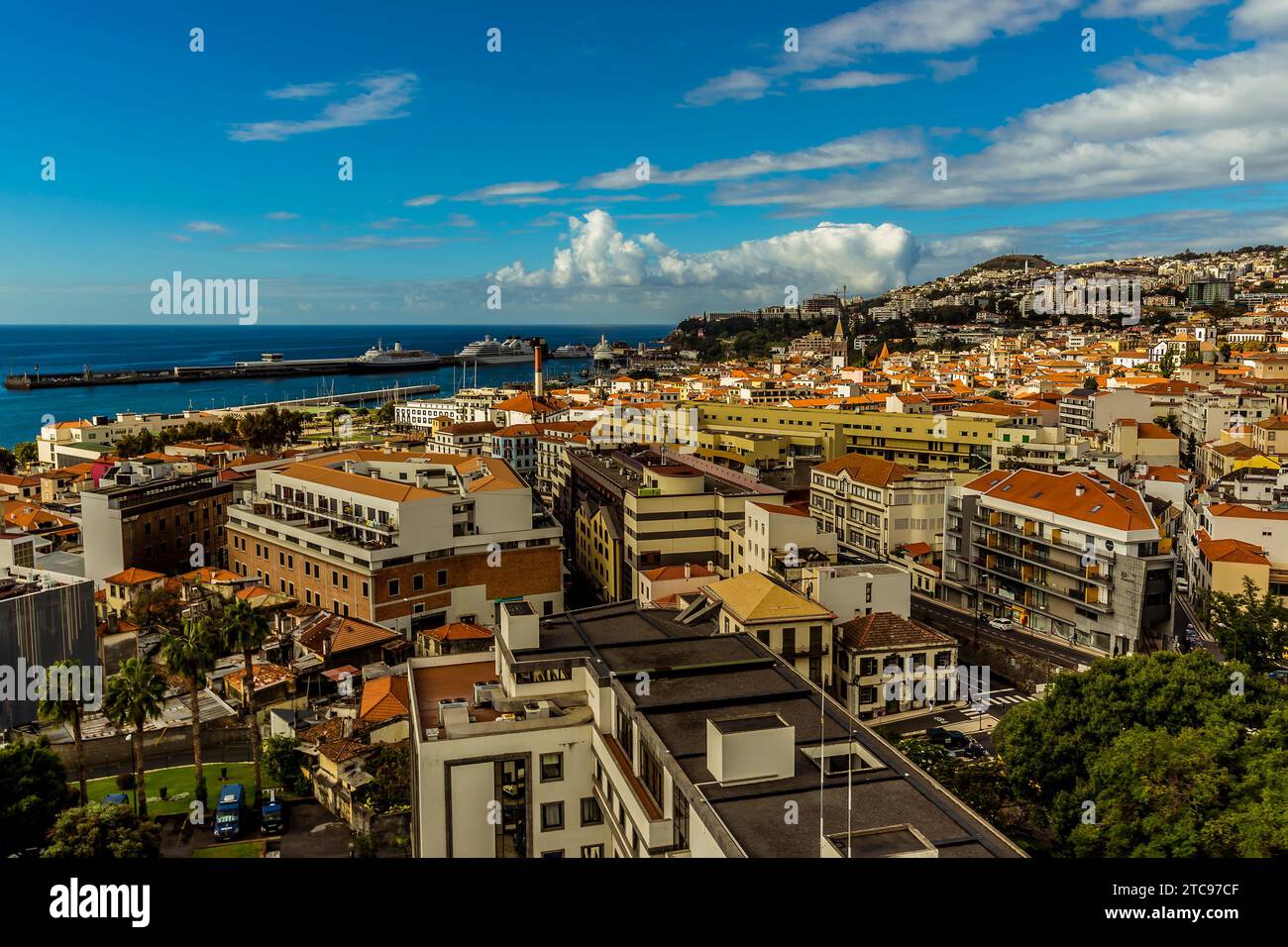A view down over the roof tops of Funchal, Madeira from the chair lift ...
