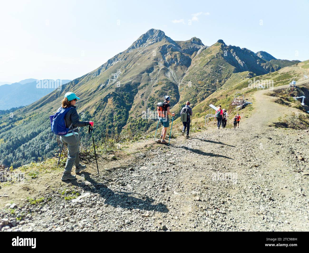 Group of tourists on trekking in the mountains Stock Photo - Alamy