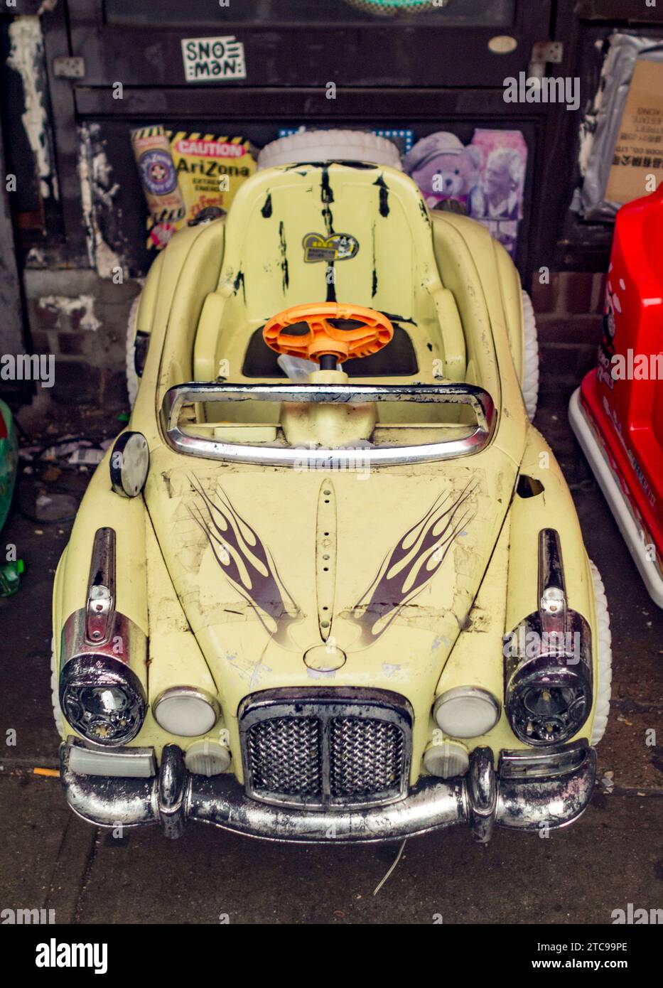 Kiddie ride at an arcade in New York Stock Photo - Alamy