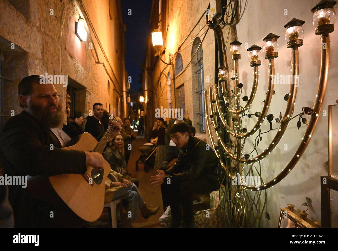 Jerusalem, Israel. 11th Dec, 2023. An Ultra-Orthodox rabbi plays the ...