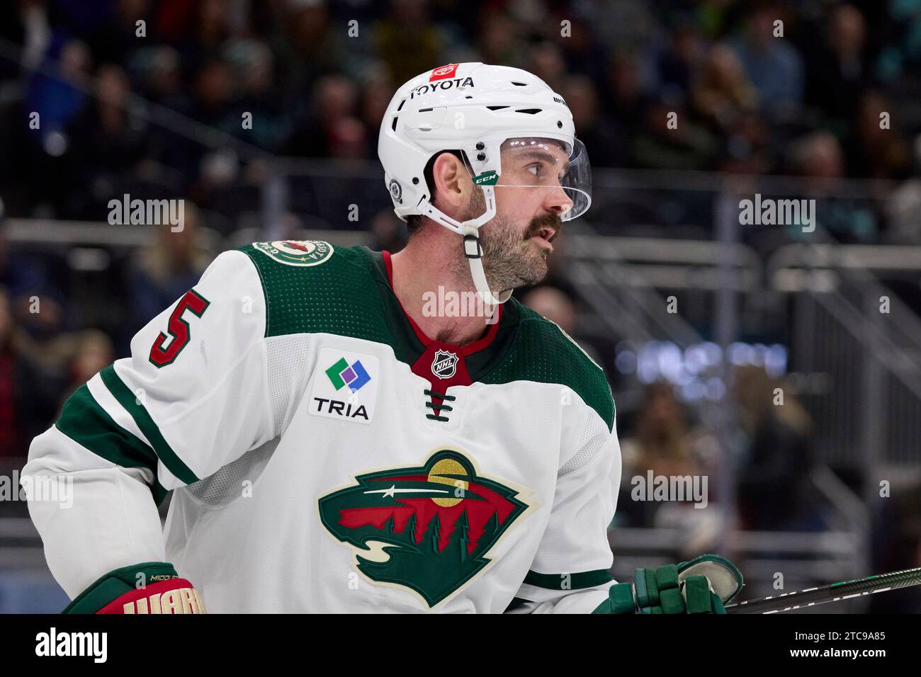 Minnesota Wild defenseman Jake Middleton (5) skates to his position for ...