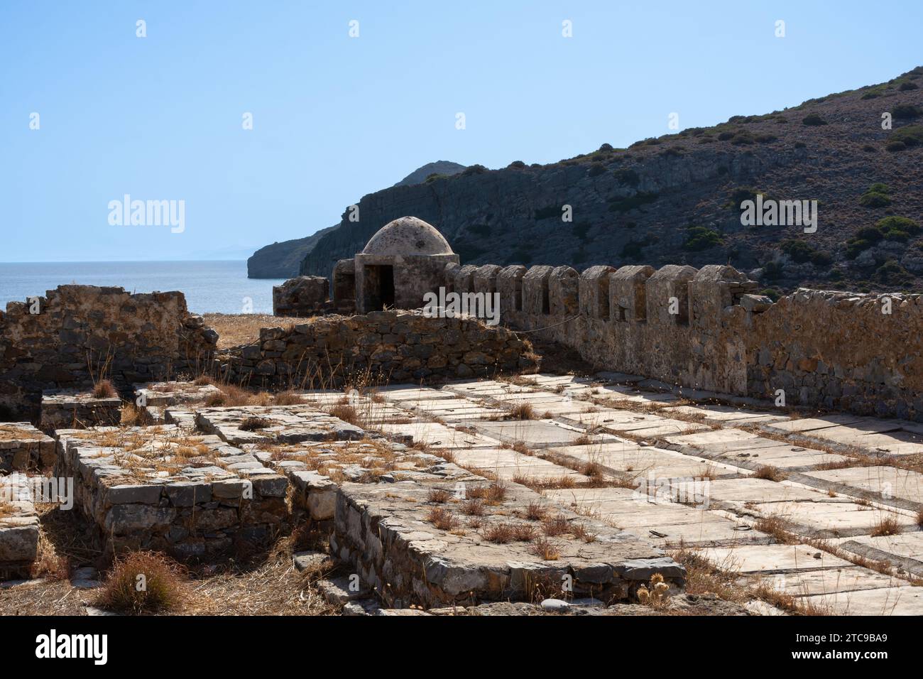 Views and pathways around the historic island of Spinalonga. Crete ...