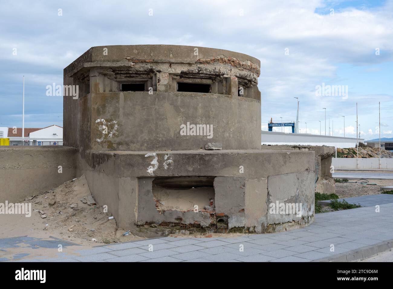 Old concrete military bunker with weathered walls, located in an urban ...