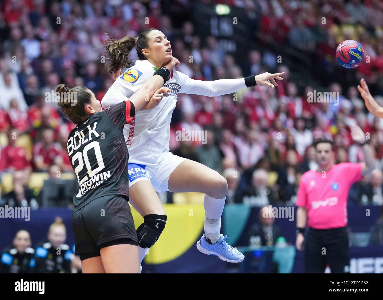 Denmark's Mie Hoejlund, right, and Germany's Emily Bolk in action ...