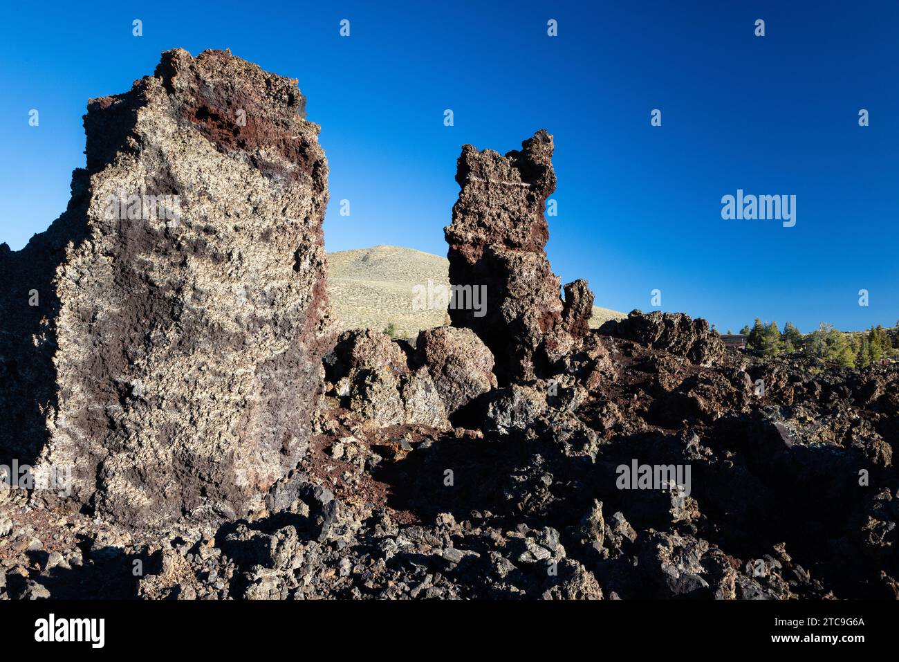 Aa lava rocks rising above the surrounding landscape along the North ...