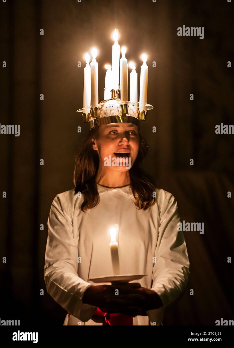 Linnea Isén wears a crown of candles symbolising St Lucy as she leads the celebration of Sankta ...