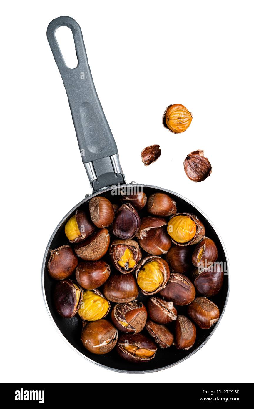 Roasted chestnuts nuts in a pan. Isolated, white background Stock Photo ...