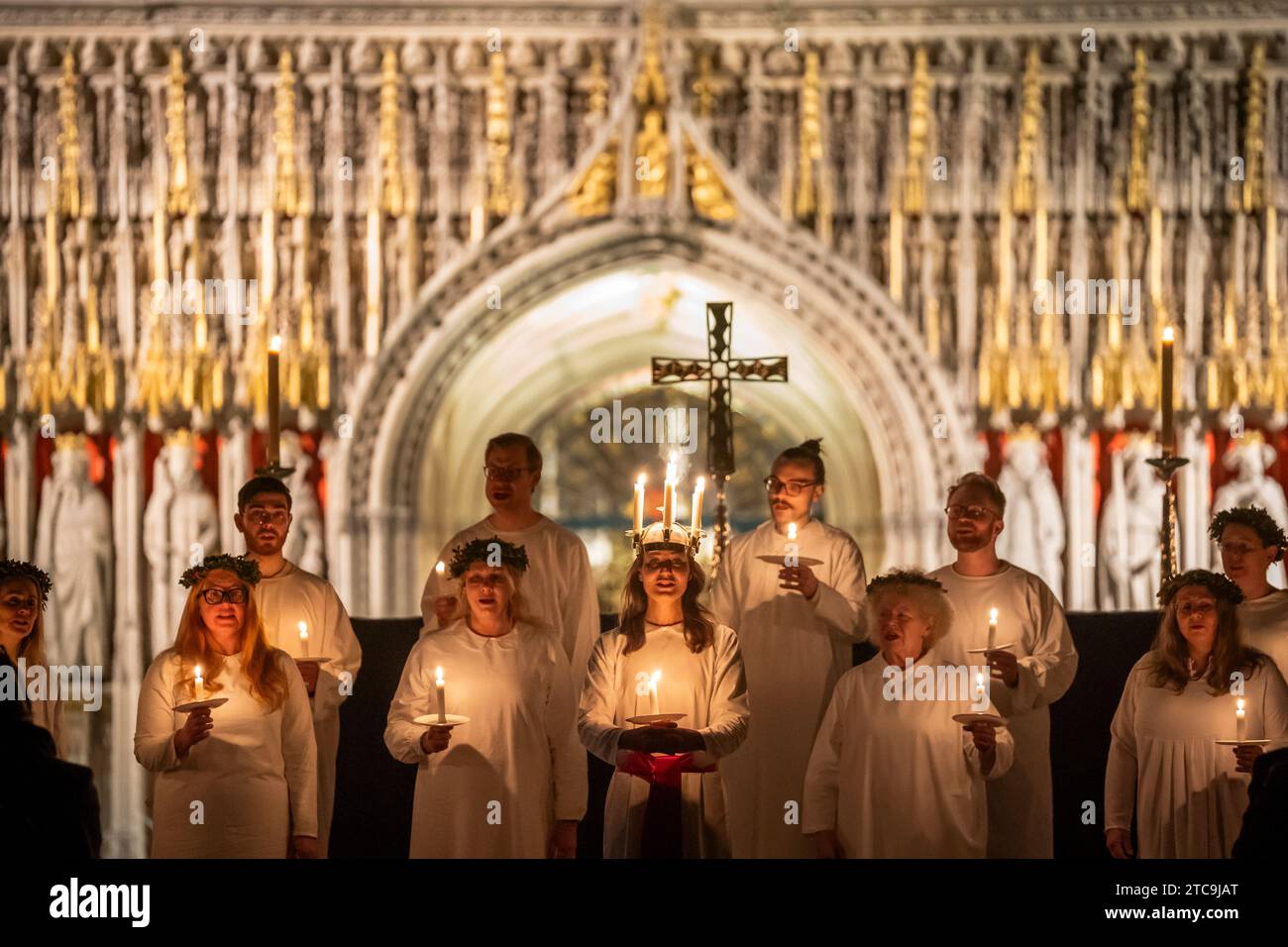 Linnea Isén wears a crown of candles symbolising St Lucy as she leads ...