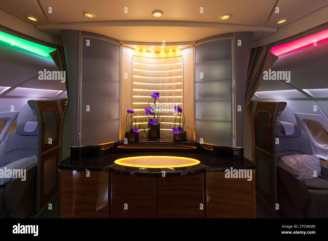 Plane interiors of the first class luxury business seats with bar and ...