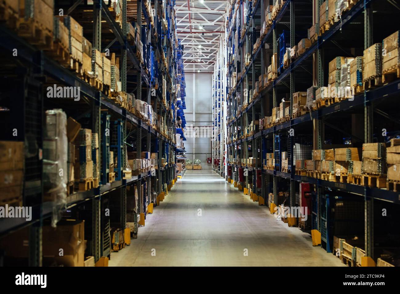 Modern warehouse interior with shelves and boxes Stock Photo - Alamy